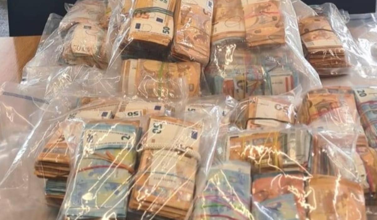 Woman arrested in Dublin as gardaí seize almost half a million euros in ...
